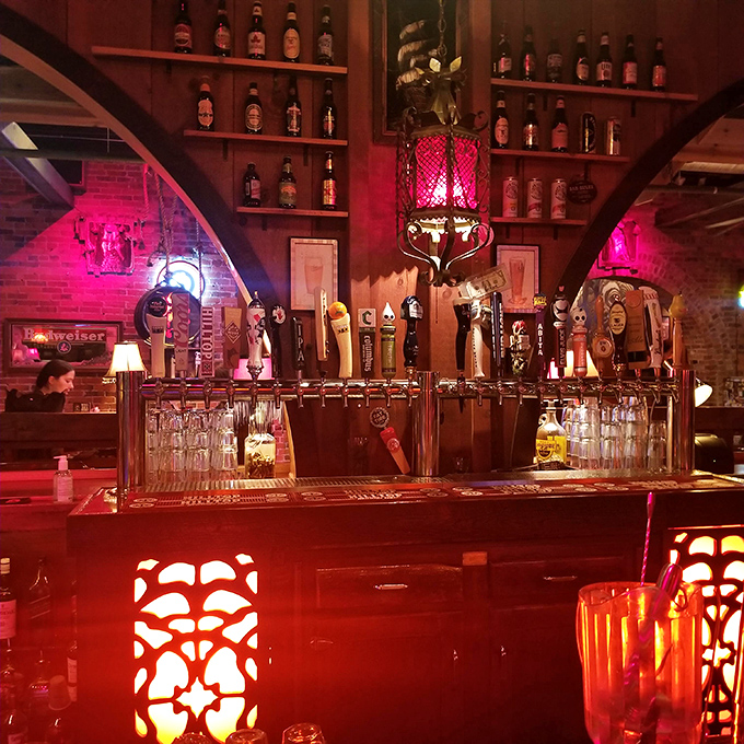 The bar area beckons with cold drinks and the promise of perfectly paired pizza combinations.