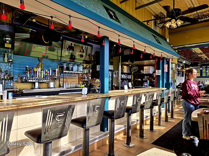 A bar where strangers become friends over craft beers and pizza debates. The stool-to-story ratio here is impressive.