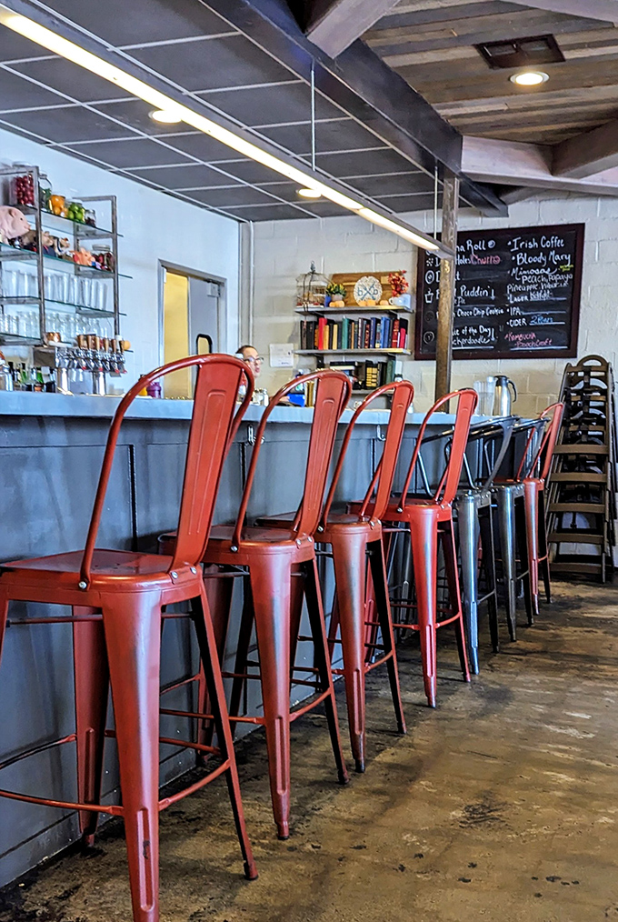 Coral-colored bar stools stand at attention like cheerful sentinels, guarding the pathway to breakfast happiness.
