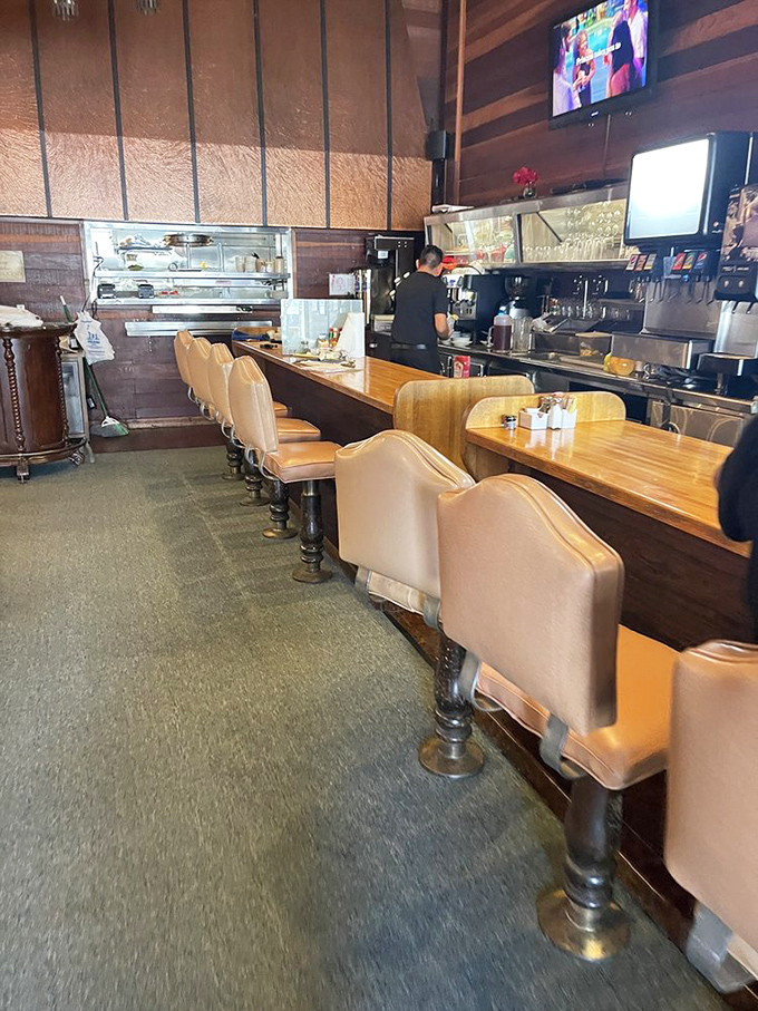 The counter seats&mdash;where solo diners become temporary family, watching short-order ballet performed by cooks who've mastered their craft through thousands of repetitions.