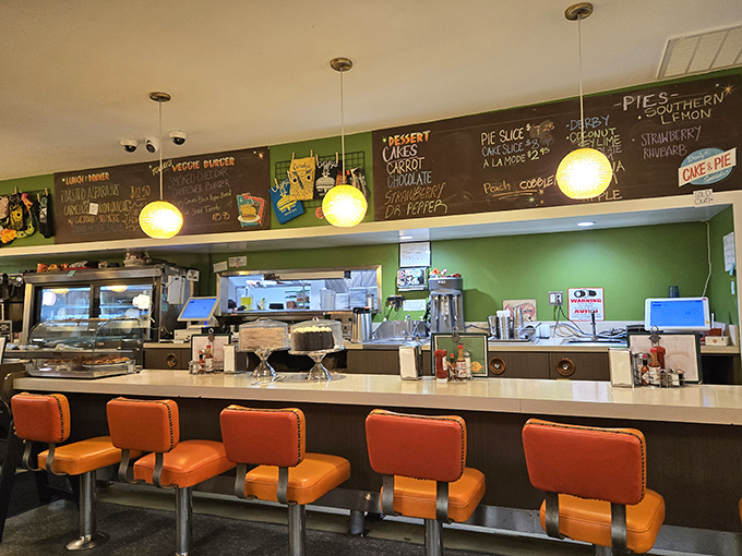 Counter seating: where solo diners become food critics and the pie selection on the chalkboard becomes your afternoon agenda.