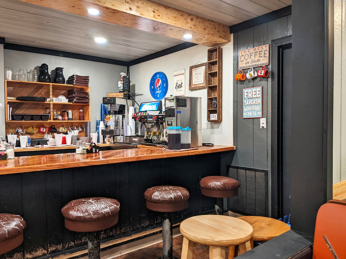 The counter where magic happens – stools worn smooth by generations of regulars who know the best seat in the house is right here.