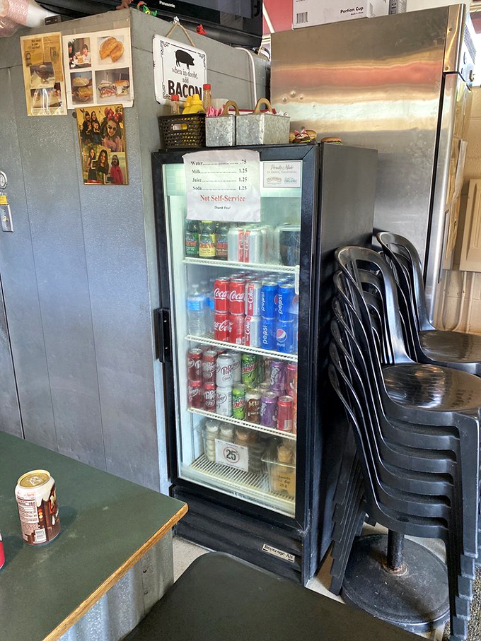 The beverage cooler&mdash;because washing down burger perfection requires proper hydration. Choose your companion wisely for this flavor journey.