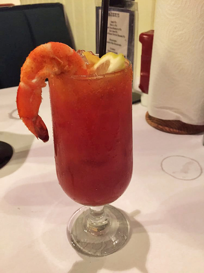 A proper Bloody Mary garnished with shrimp isn't just a cocktail&mdash;it's an appetizer in disguise, bringing spicy satisfaction with every sip.