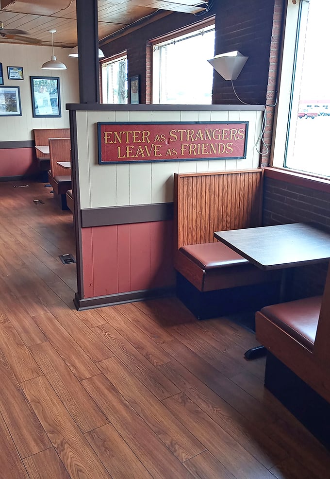 "Enter as Strangers, Leave as Friends" &ndash; truer words were never posted in a chicken joint.