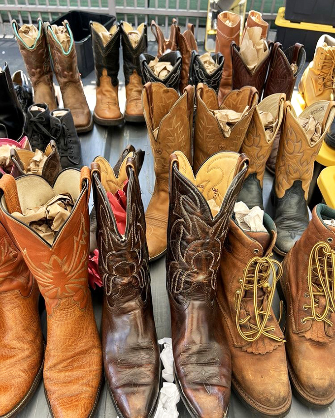 These well-worn cowboy boots have kicked up dust across decades, each scuff and crease telling tales of adventures past. 
