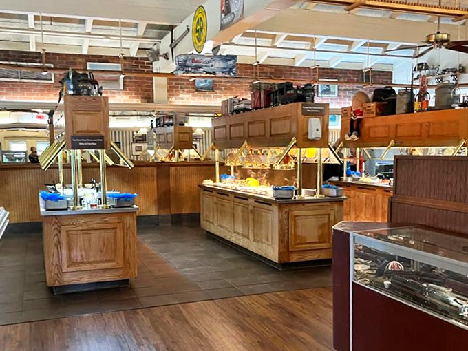 The buffet bar stands ready like a delicious soldier, armed with sides and salads galore.