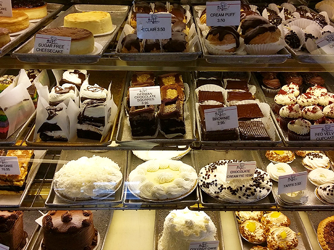 Not so much a display case as a museum of sweet possibilities. Each shelf offers a different path to dessert nirvana. 