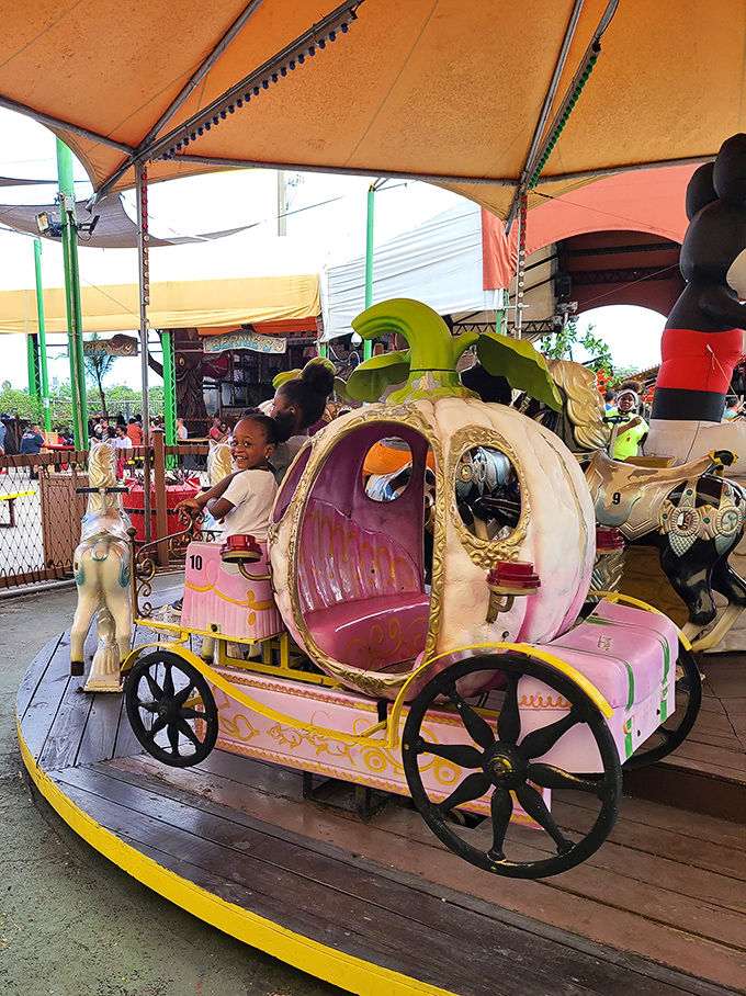 The carousel spins while shoppers circle below, both following the eternal rhythm of the hunt.