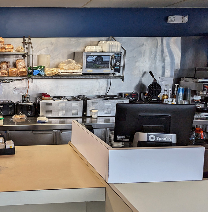 The command center of comfort food operations, where toast is monitored with military precision and coffee flows like a river.