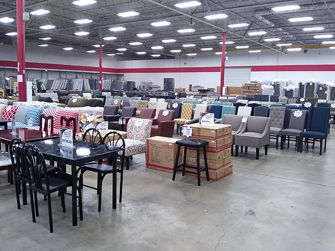 Dining sets and accent chairs await new homes and fresh conversations. That black table has probably hosted everything from homework sessions to holiday feasts.