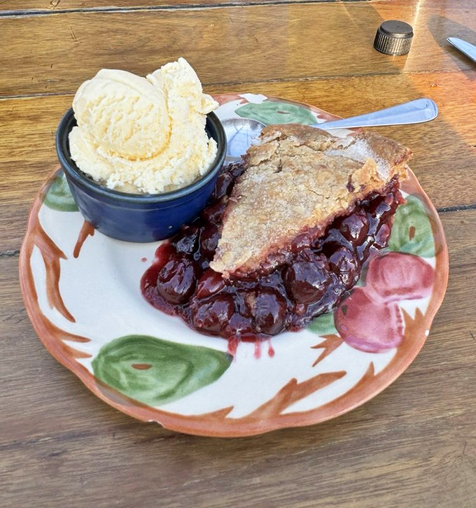 Cherry pie that captures Michigan's soul on a plate. That scoop of vanilla ice cream isn't melting&mdash;it's swooning in the presence of greatness.