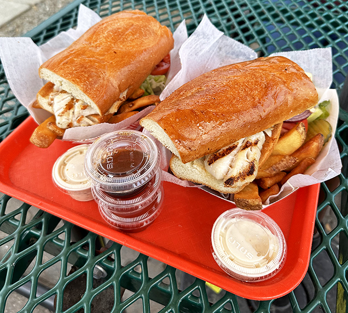 Even the sandwiches come dressed for the occasion, nestled in paper boats with fries standing at attention alongside.