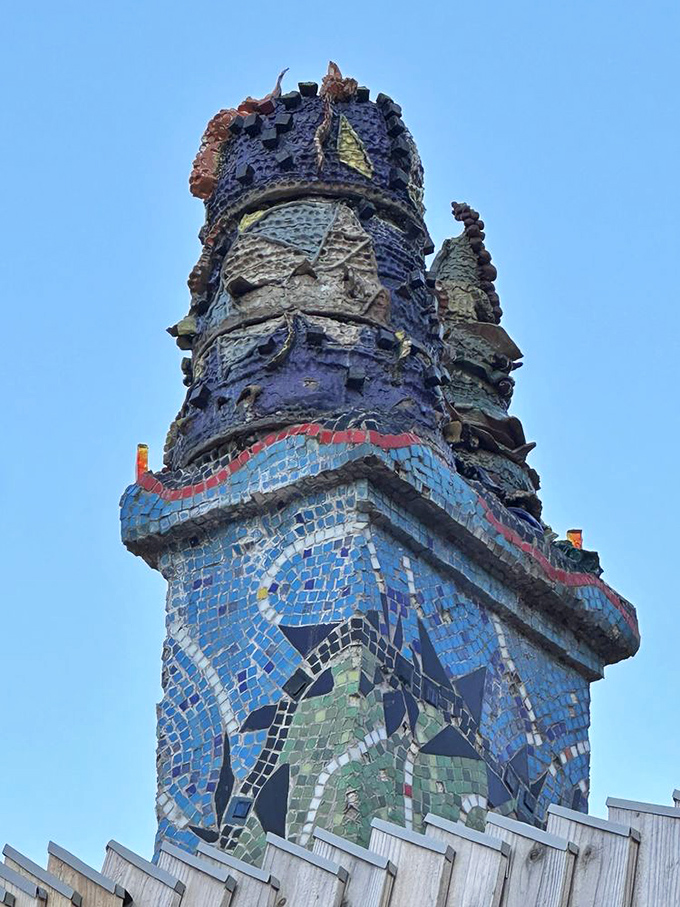 That tower reaches skyward like a mosaic-covered exclamation point declaring independence from architectural conformity.