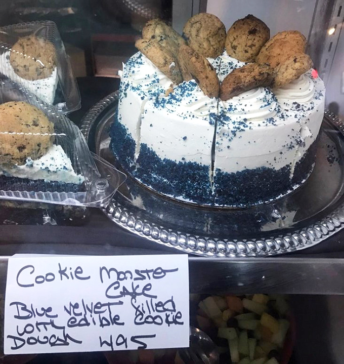 The Cookie Monster cake isn't just dessert; it's a childhood fantasy realized. Blue velvet with cookie dough? Someone clearly understands the meaning of joy.
