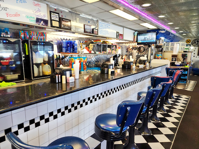 The counter&mdash;that sacred space where solo diners find community, coffee cups are never empty, and blue swivel stools have witnessed countless life stories.