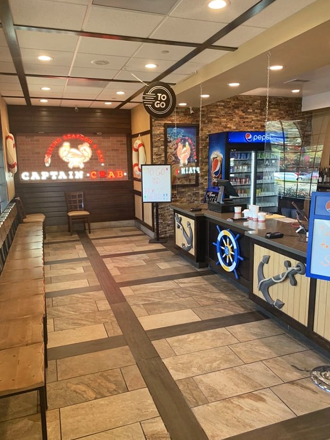 The nautical-themed counter says "Ahoy!" while the neon sign whispers "Take some home for later." Smart thinking.