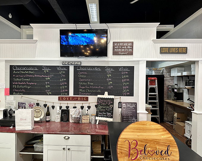 The expanded menu board reveals even more possibilities – proof that heaven isn't just a place, it's a selection of cheesecakes.