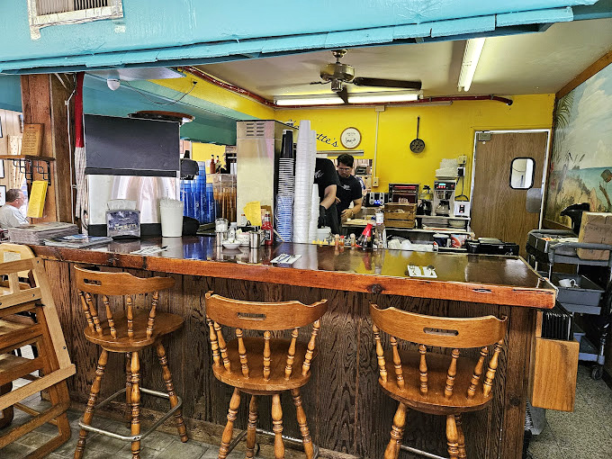 The polished counter invites solo diners to pull up a stool and enjoy the show.