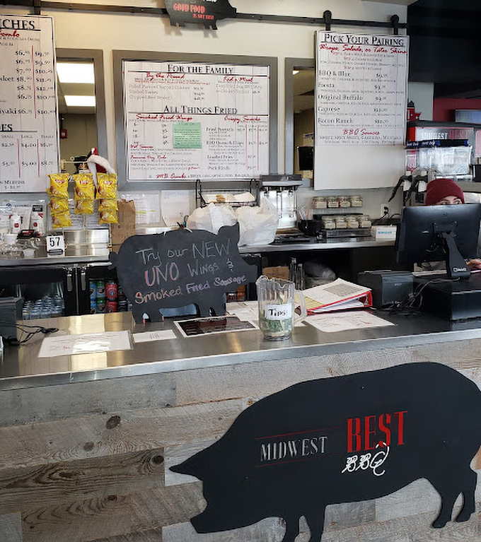 The ordering counter&mdash;where dreams are spoken aloud and then materialized as smoke-infused reality. That pig silhouette knows what's up.