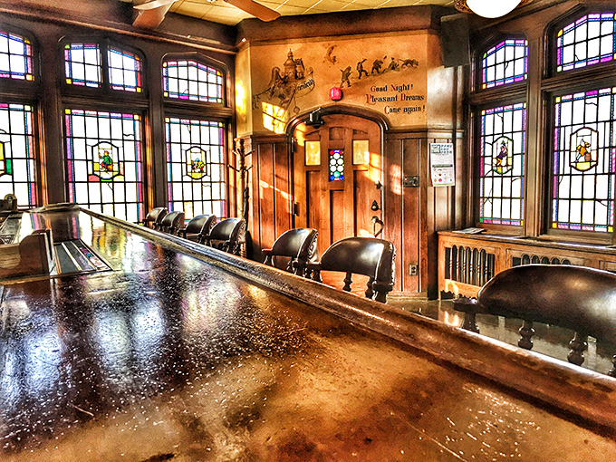The bar stands ready like an old friend, those stools have heard more stories than a confession booth.