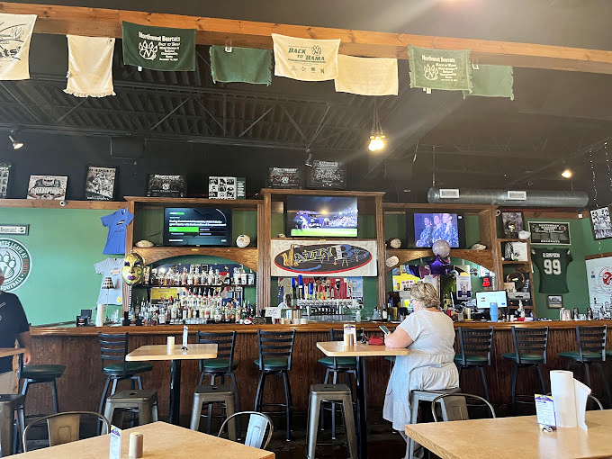 The bar area doesn't just serve drinks&mdash;it serves community. Those barstools have heard more local stories than a small-town librarian.