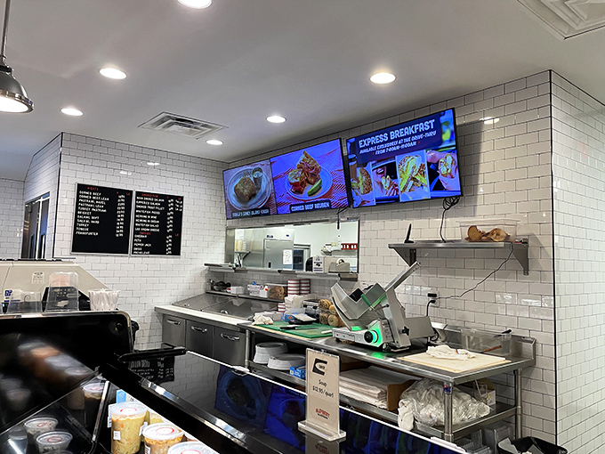 Behind white subway tiles and stainless steel lies the command center where breakfast dreams become delicious reality.