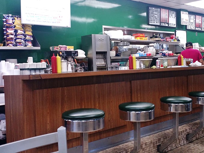 No designer lighting or trendy decor here&mdash;just the warm glow of fluorescents illuminating decades of satisfied customers and American flags.