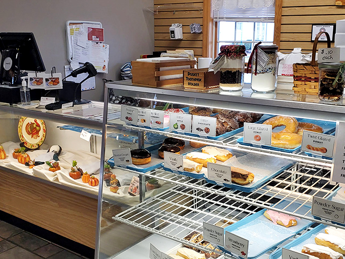 Behind this counter, pastry magic happens daily, transforming flour, sugar, and butter into reasons to drive across state lines.