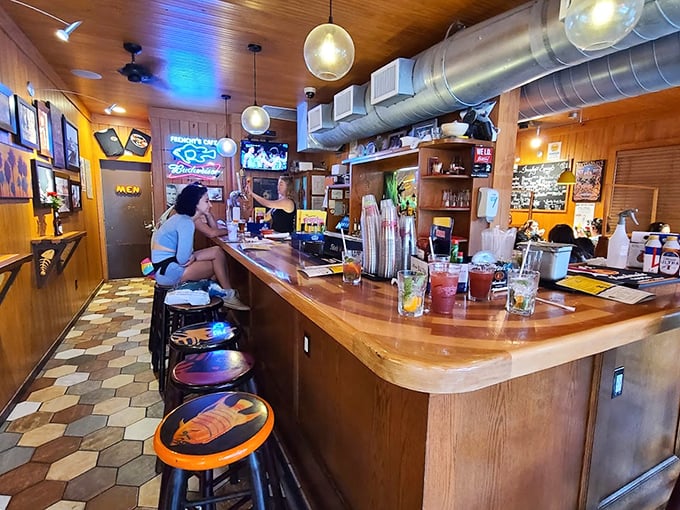 The bar at Frenchy's&mdash;where strangers become friends and friends become regulars. Wood-worn and wonderful, just as a beach bar should be.