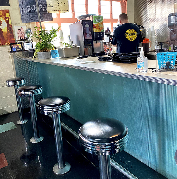 The counter seats offer front-row tickets to the breakfast theater happening in the open kitchen.