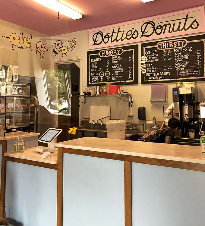 Behind this counter, vegan alchemy happens daily, transforming simple ingredients into donut gold that defies expectations.