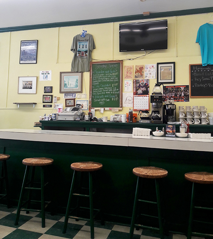 Counter seating: where solo diners become part of the Thomas Caf&eacute; family. Cork-topped stools have witnessed countless coffee refills and life stories.