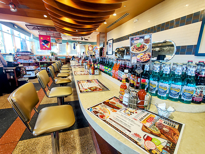 Counter seating: where solo diners become temporary family and every plate that passes by causes serious order envy.