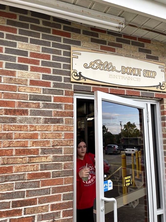 The entrance sign promises donuts but delivers happiness. Like a portal to a parallel universe where diet culture doesn't exist.