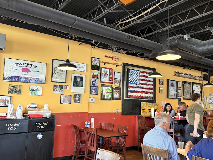 Yellow walls adorned with memories, awards, and patriotism. It's like eating in a BBQ hall of fame where the trophies are on the plate.