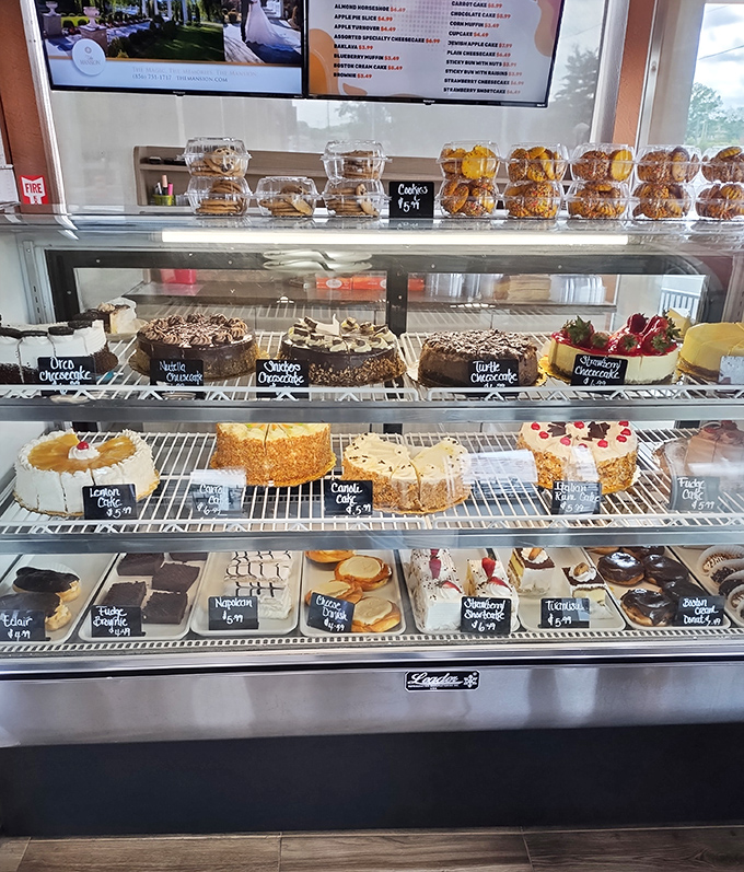 The dessert case&mdash;a glass-enclosed museum of temptation where willpower goes to die and "I'll just have coffee" becomes "and a slice of that cheesecake."