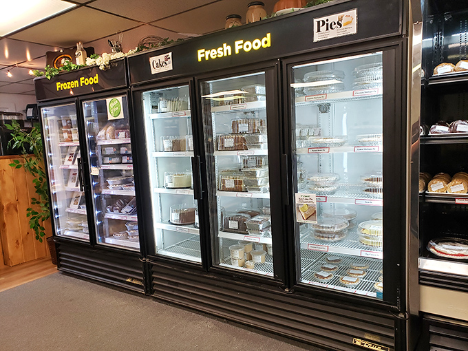 Display cases showcase an array of desserts that would make a food photographer weep with pure, unadulterated joy.