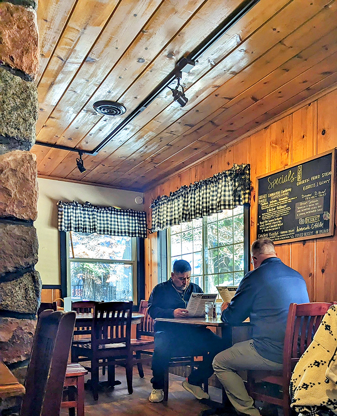 The checkered curtains and pine-paneled walls aren't just d&eacute;cor&mdash;they're a time machine to when breakfast conversations weren't interrupted by notification pings.
