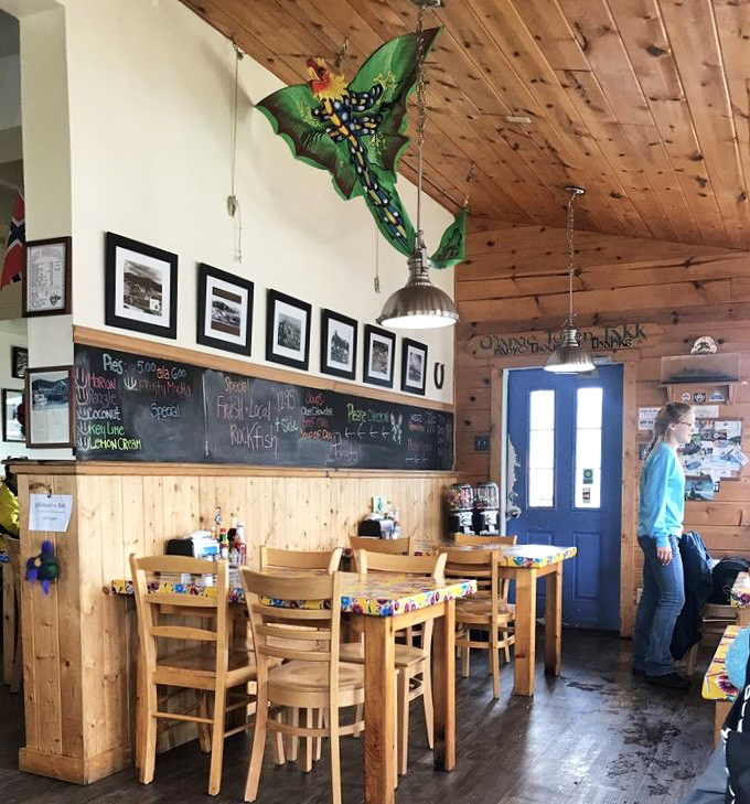 Whimsical butterfly art watches over diners like a colorful guardian angel. Even the décor here refuses to take itself too seriously.