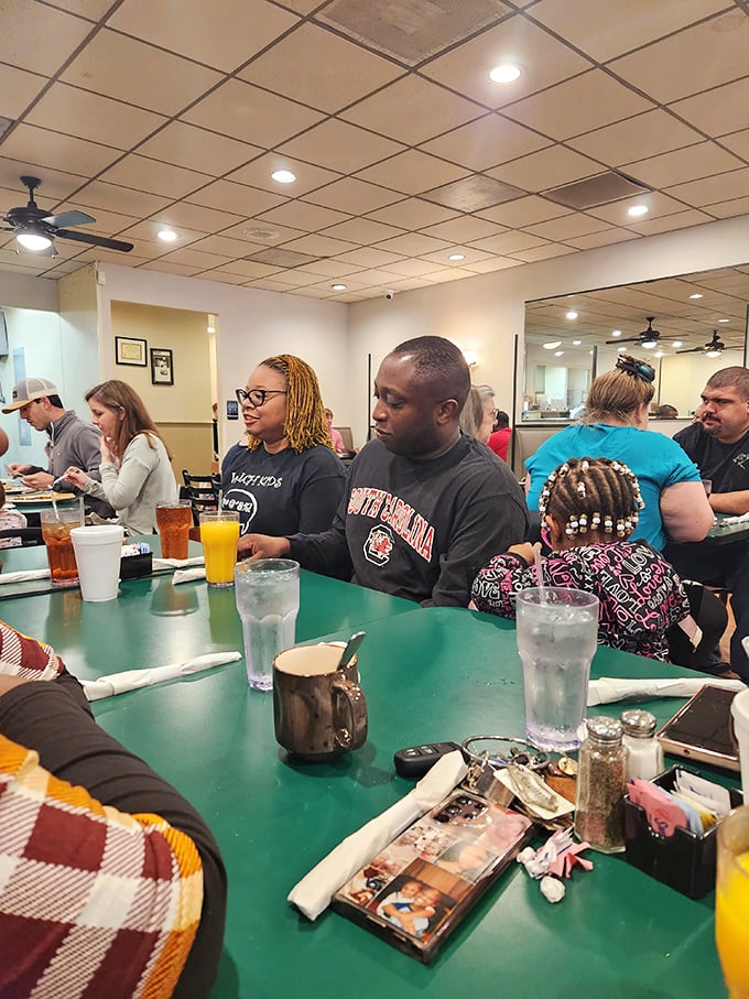 Where South Carolina comes to fuel up. Orange juice glows like liquid sunshine while conversations flow as freely as the coffee.