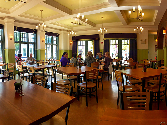 The dining room hums with conversation and clinking silverware &ndash; the soundtrack of satisfaction playing beneath those gorgeous coffered ceilings.