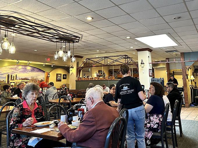 Where strangers become neighbors over plates of pot pie. The dining room hums with the universal language of "mmm."