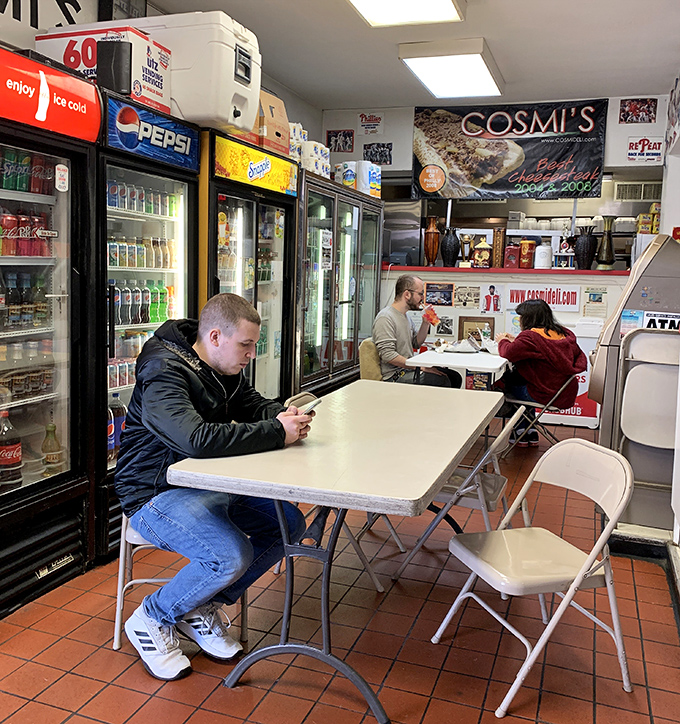 The natural habitat of the Philly sandwich enthusiast. Notice the focused concentration&mdash;that's the face of someone having a religious experience.