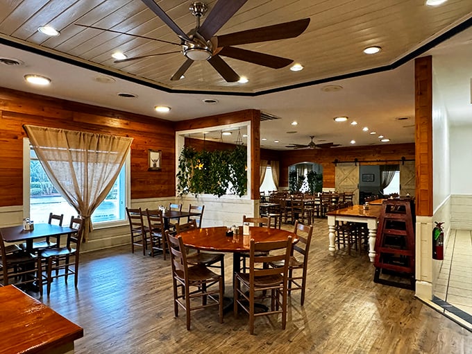 Wooden tables bathed in natural light, ceiling fans spinning lazily overhead &ndash; a dining room that invites you to stay awhile.