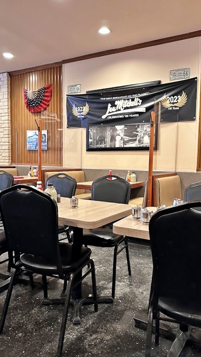 A banner celebrating 100 years of serving "the best breakfast on the planet" &ndash; a century-long streak that few restaurants can claim with such well-earned confidence.