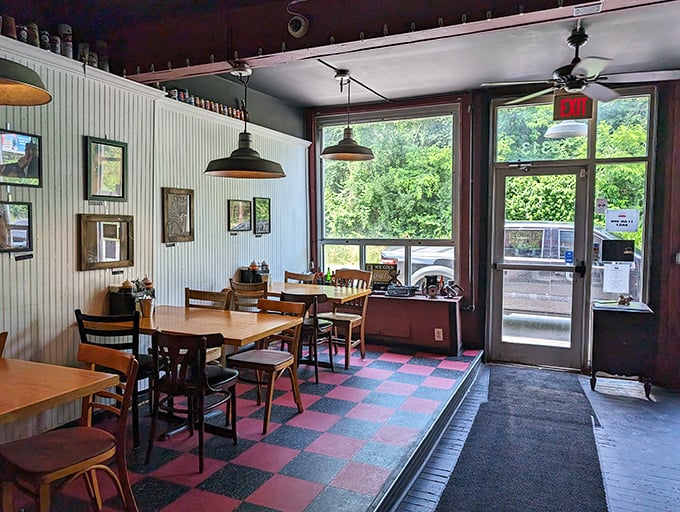 A dining room where natural light meets barbecue dreams. The checkerboard floor isn't just retro&mdash;it's the perfect backdrop for food decisions that are anything but checkered.