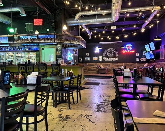 The calm before the storm. Empty tables waiting for the parade of outrageous food creations that will soon grace their surfaces.