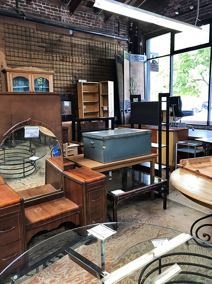 Furniture tetris at its finest&mdash;vintage vanities and practical tables arranged in a home decorator's dream obstacle course.