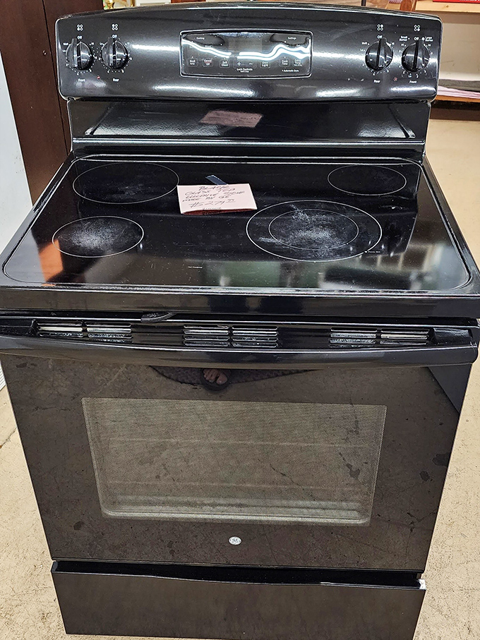 This black stove might have cooked thousands of family dinners, and now waits patiently for its next kitchen to call home.